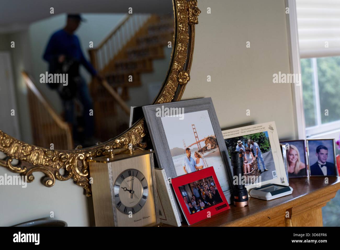 Family photos are displayed in the house of Christy Morrill, who lost ...