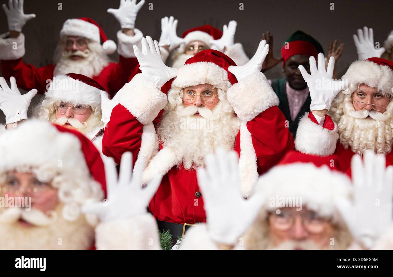 EDITORIAL USE ONLY Santas take part in the Ministry of Fun's annual ...