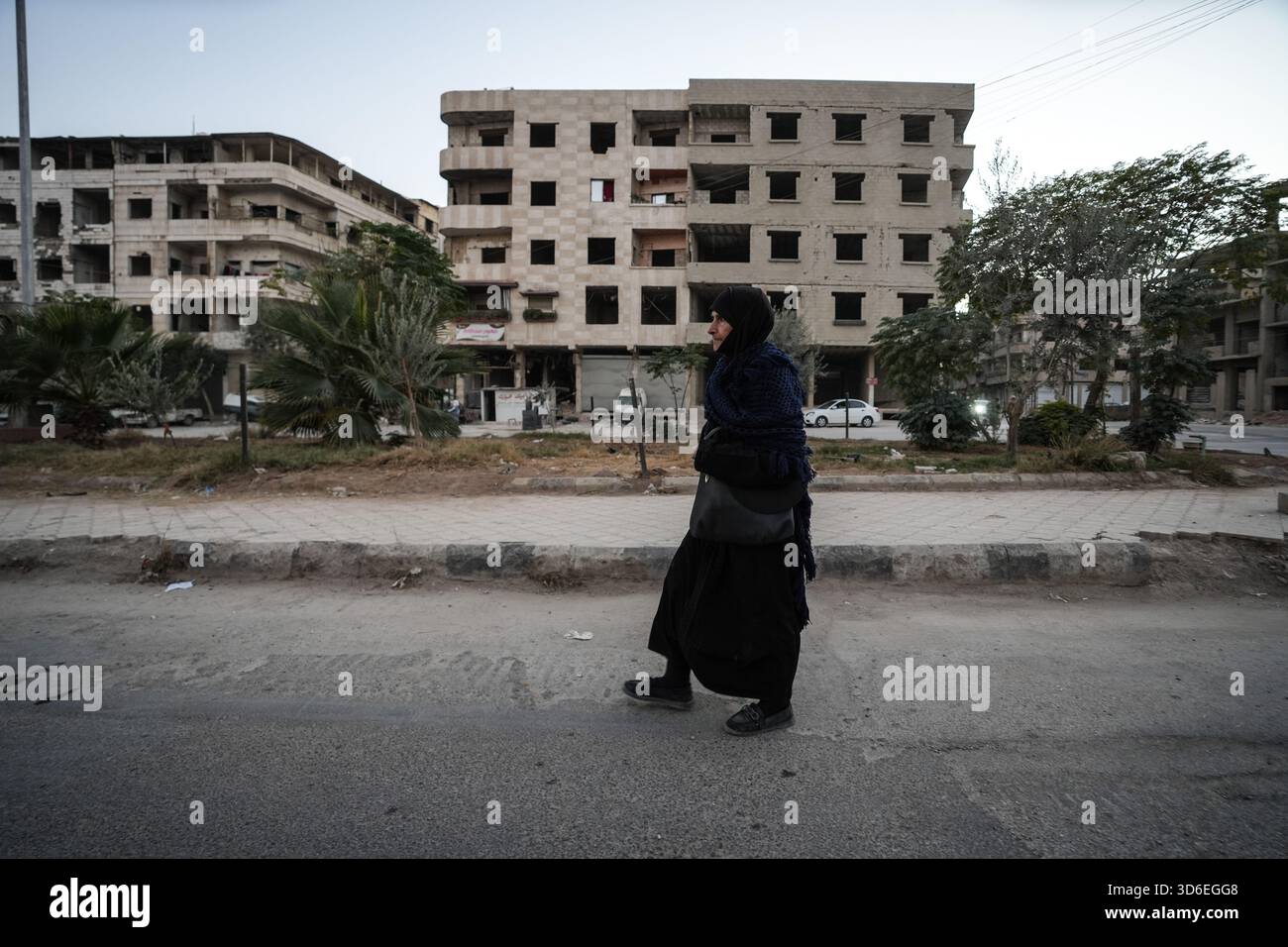 19 November 2025, Syria, Harasta: Syrian woman Hadiya, 71, who lives in ...