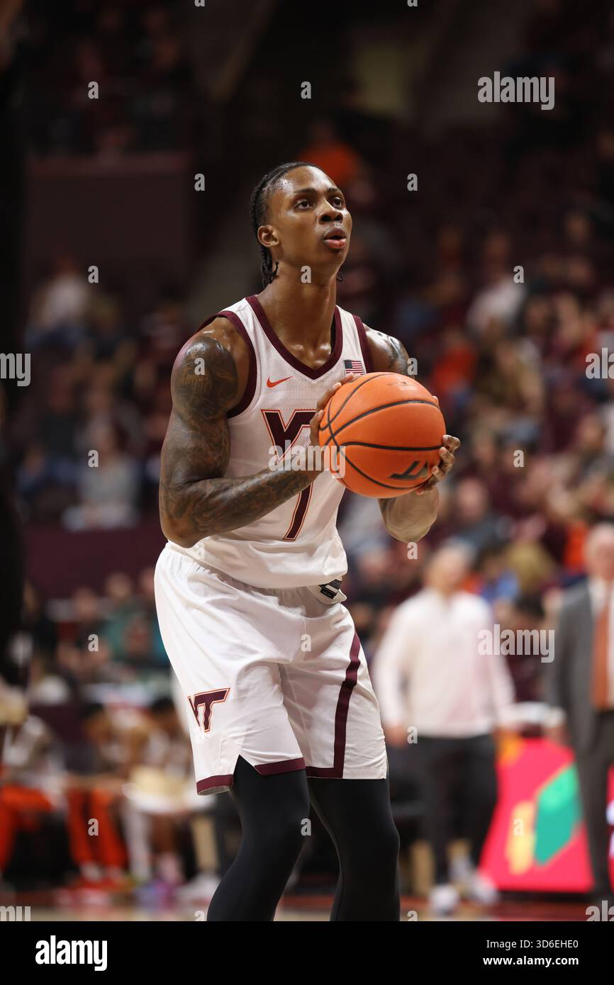 Virginia Tech Hokies forward Tobi Lawal (1) shoots a free throw at ...