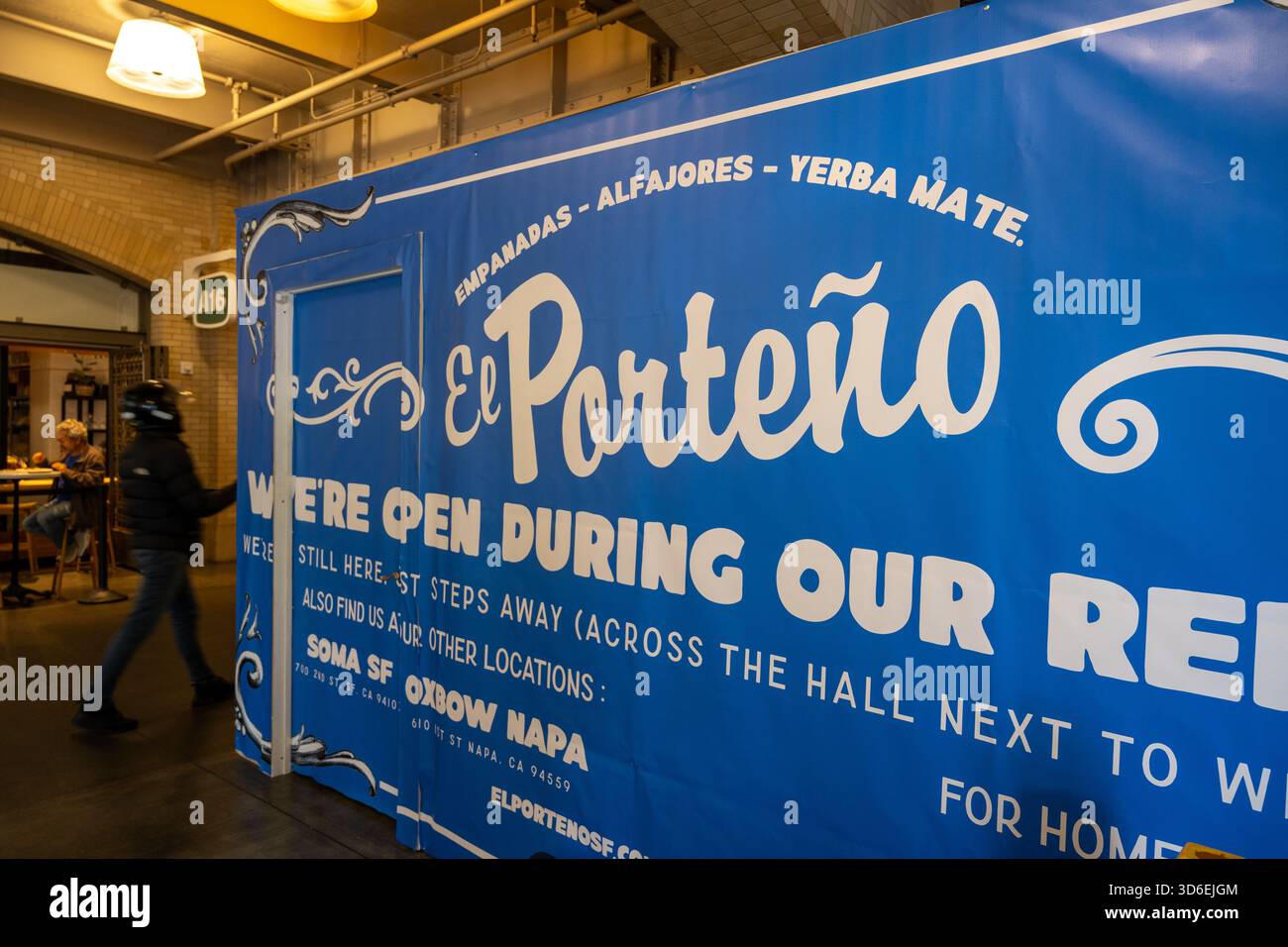 Blue El Porteno empanadas banner reading 'We are open during our ...