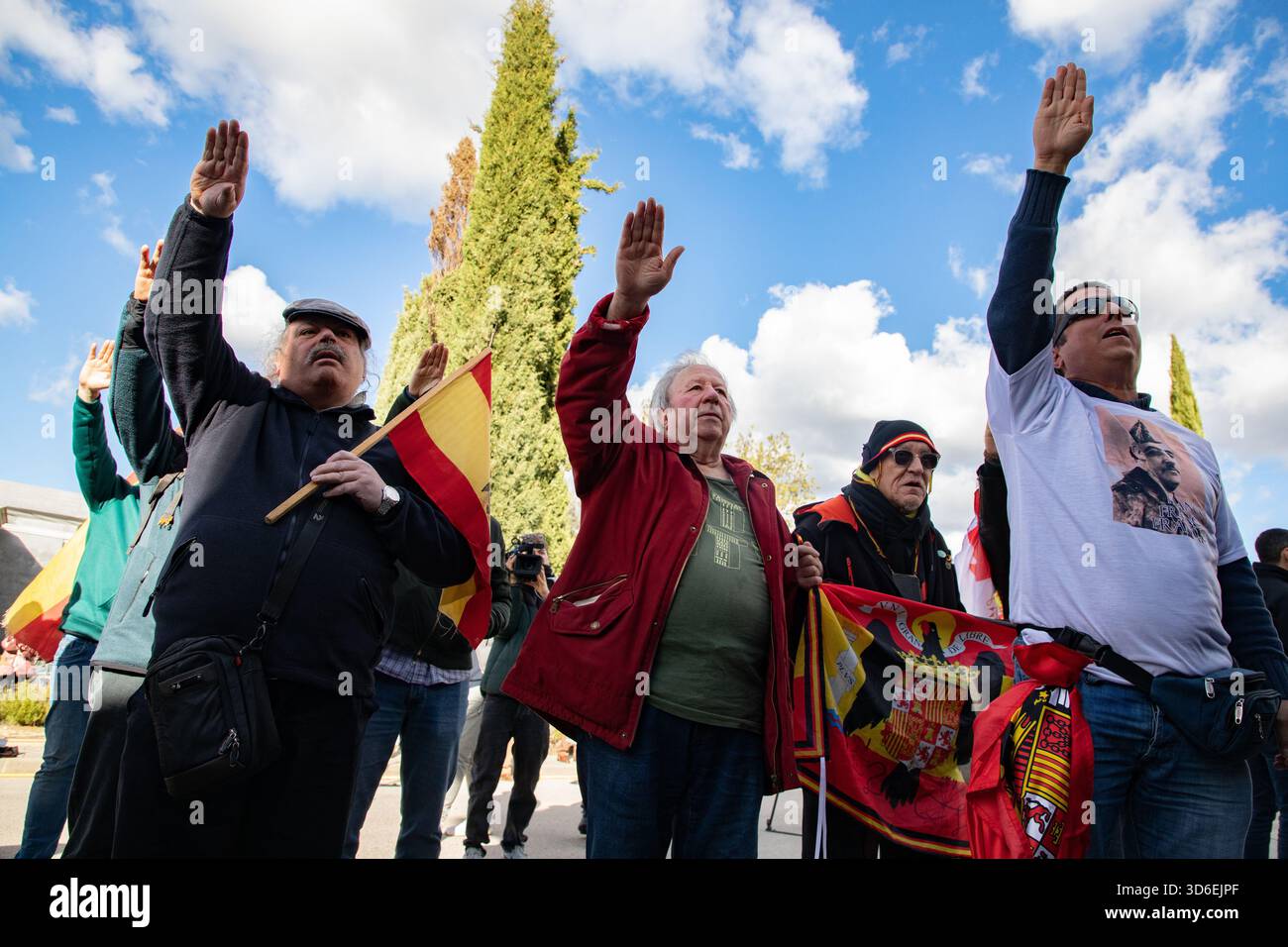 Several people perform the fascist salute during a tribute organized by ...