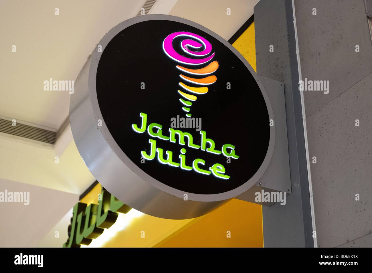 Illuminated circular Jamba Juice sign inside shopping mall, San ...