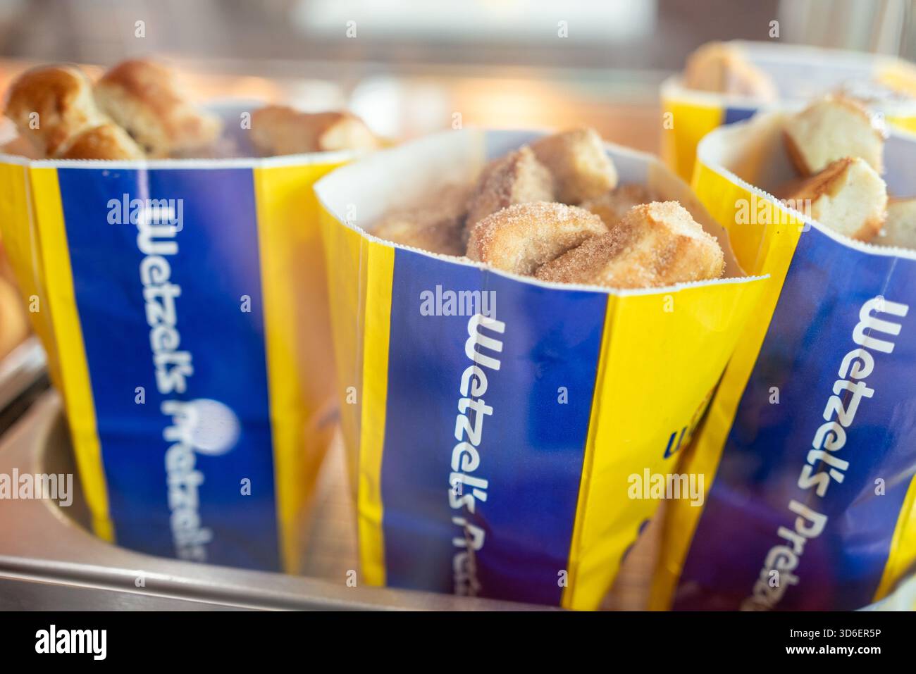 Close-up of Wetzel's Pretzels containers with pretzel bites and logo ...