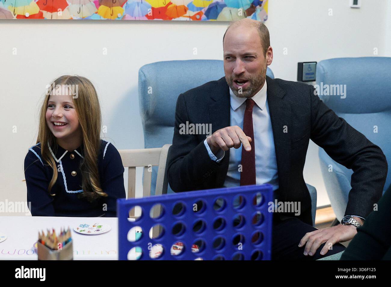 The Prince of Wales sits next to Maya, daughter of the late rugby ...
