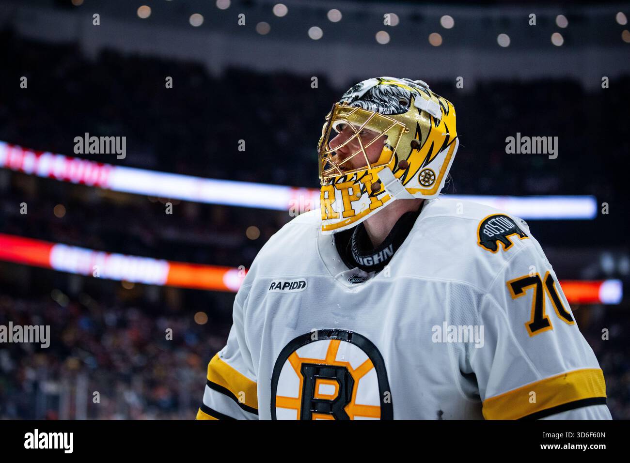 Boston Bruins goaltender Joonas Korpisalo (70) waits for play to begin ...