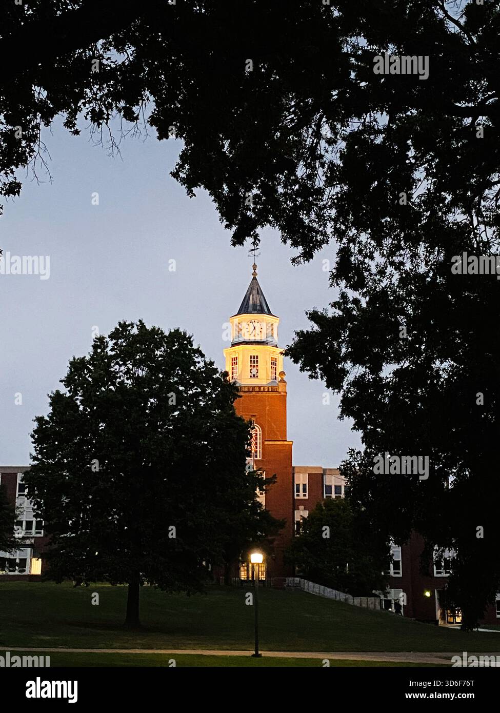 Evening view of a brick clock Pulliam Hall tower on a campus in ...