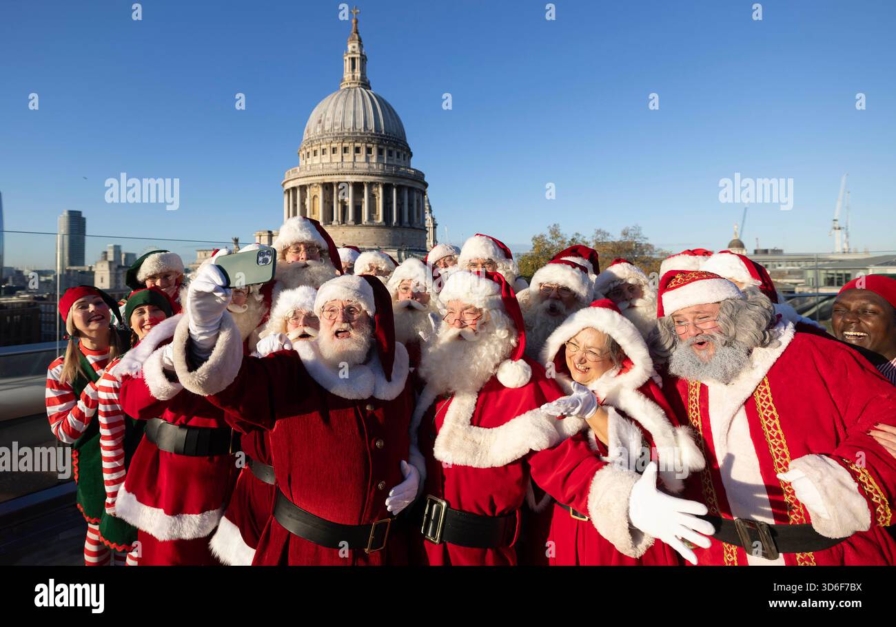 EDITORIAL USE ONLY Santas trained by the Ministry Of Fun's Santa School ...