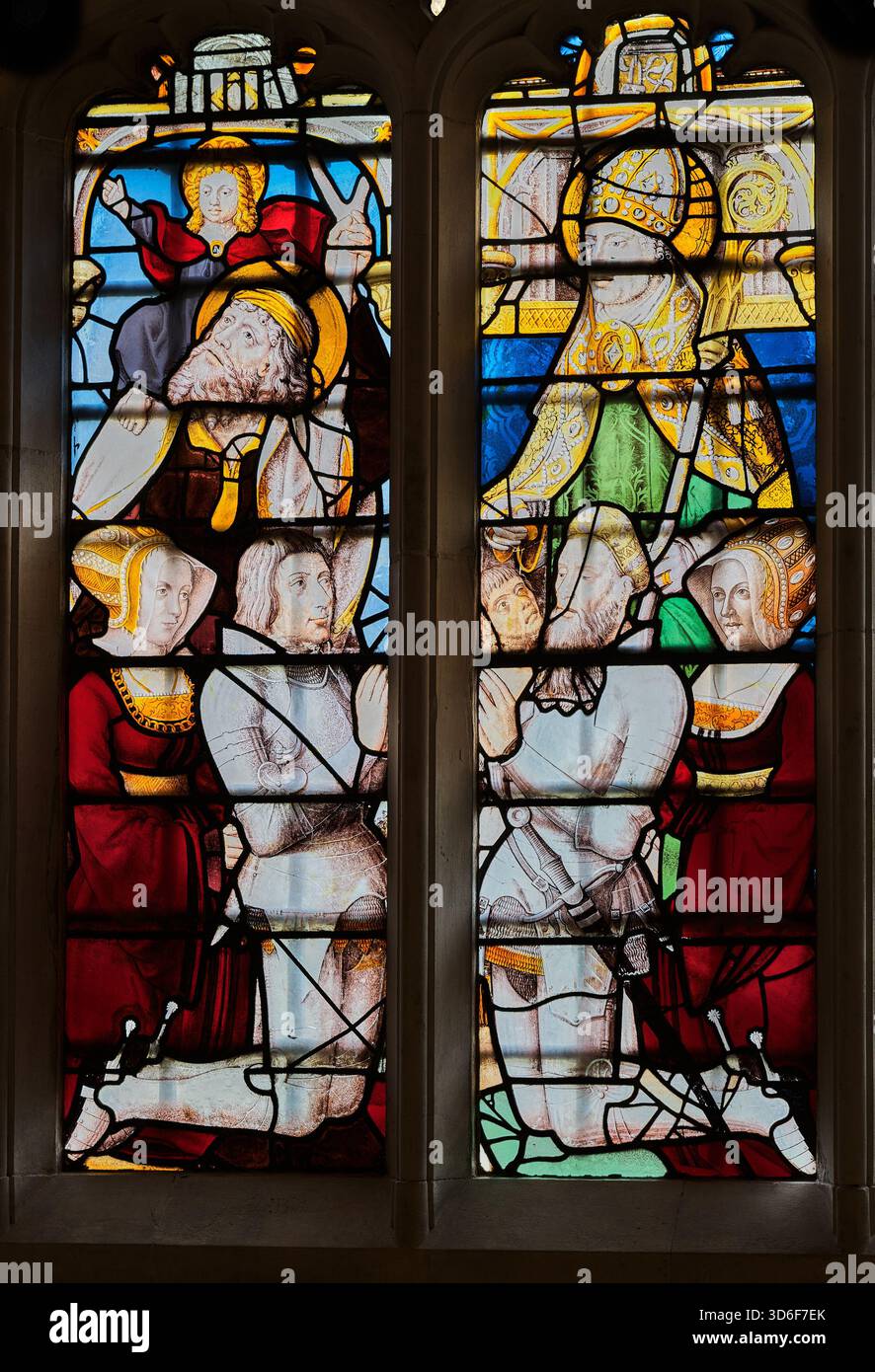 Stained glass window, of people praying for the dead, in All Souls ...