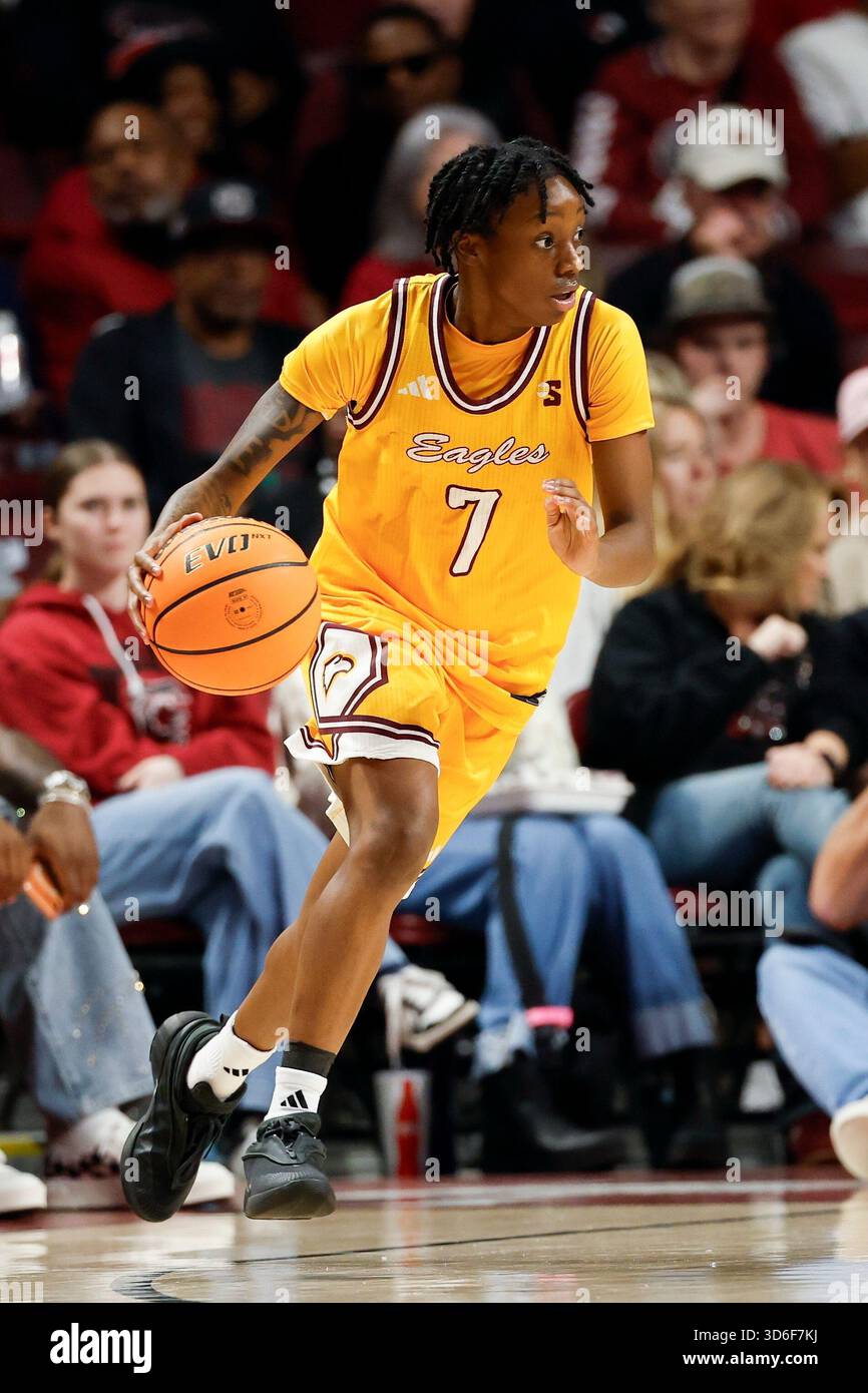 Winthrop guard Ryiah Wilson moves the ball during the first half of an ...