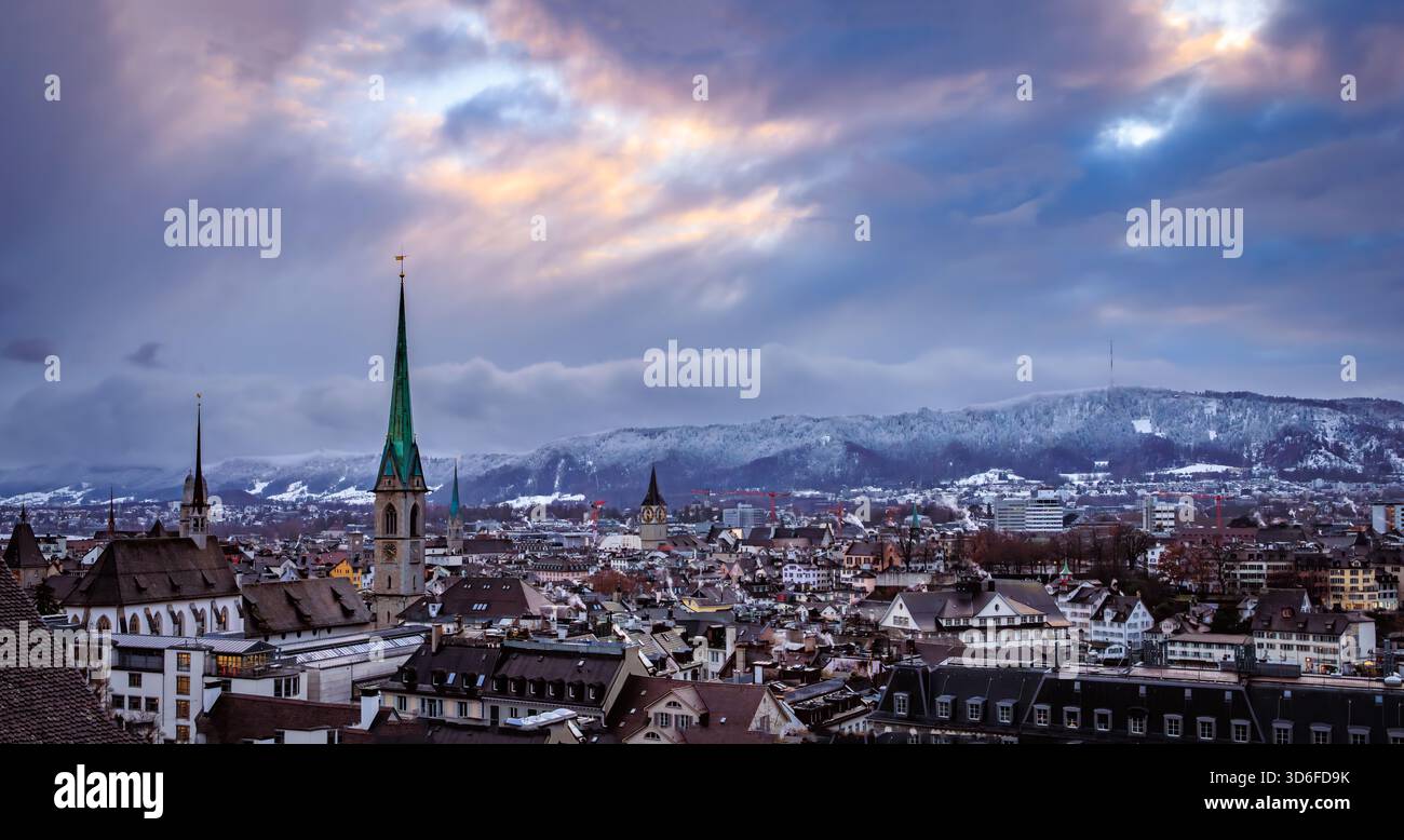 Aerial winter cityscape with iconic church towers, terracotta tile ...