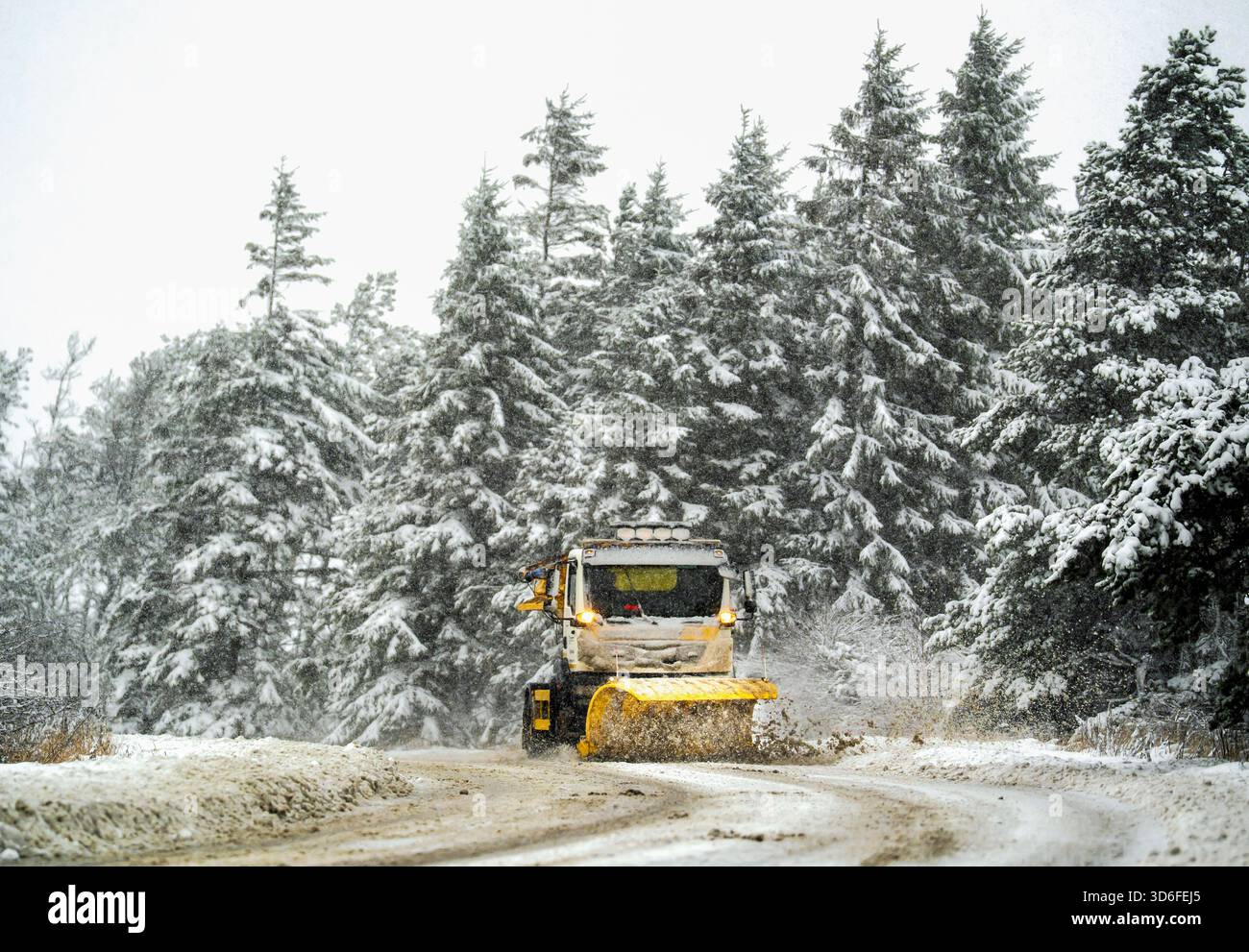 A snow plough on the A169 between Pickering and Whitby on the North ...