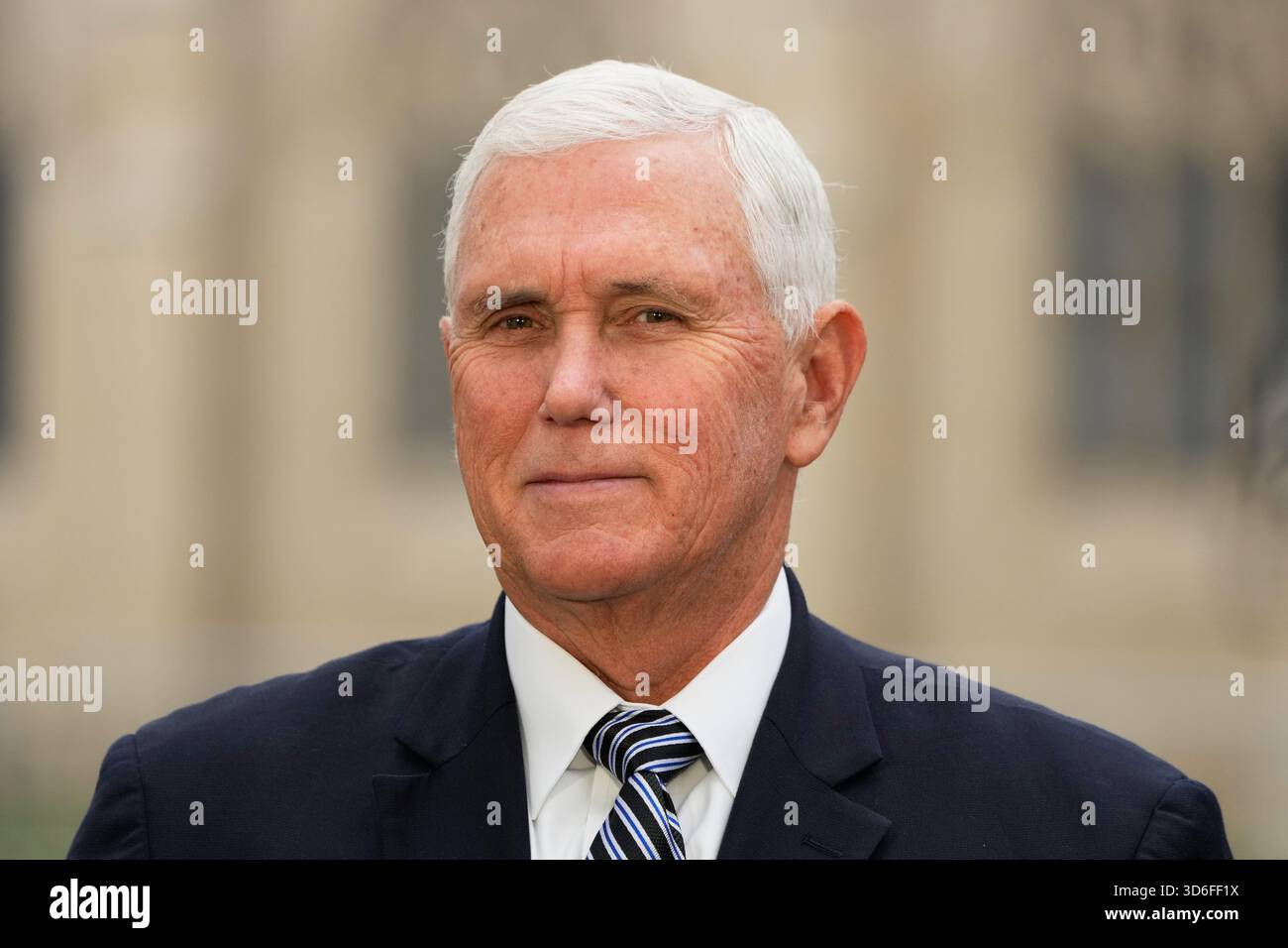 Former Vice President Mike Pence looks on before the funeral services ...