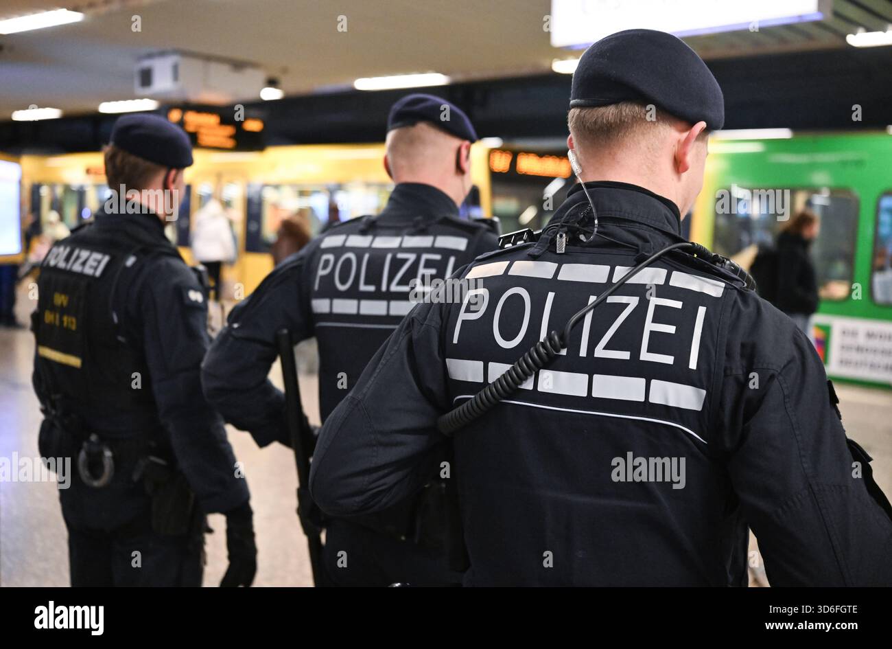 20 November 2025, Baden-Württemberg, Stuttgart: Police officers at the ...
