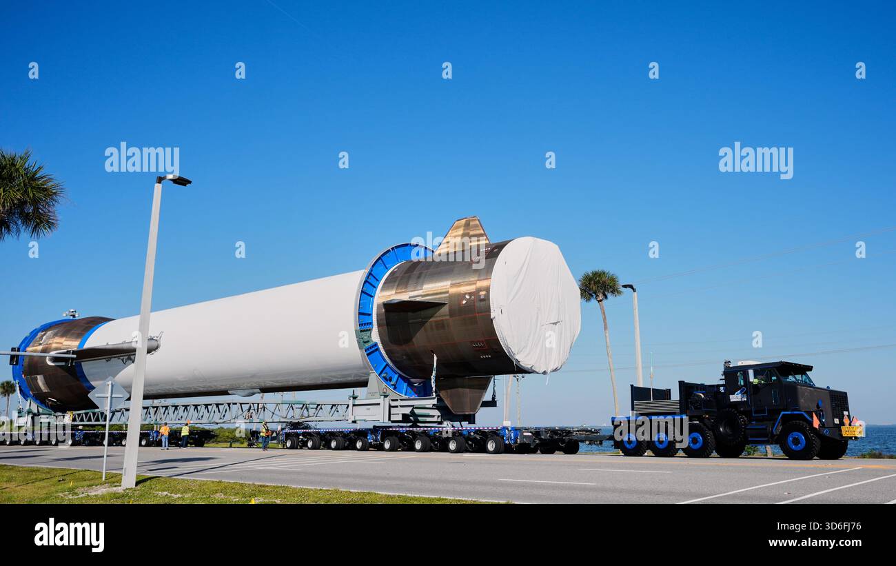 A 190 foot long New Glenn GS1 Booster rocket makes it's way back to the ...
