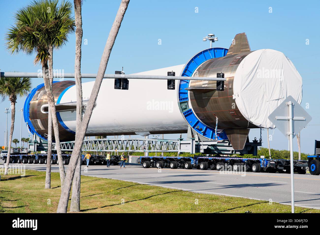 A 190 foot long New Glenn GS1 Booster rocket makes it's way back to the ...