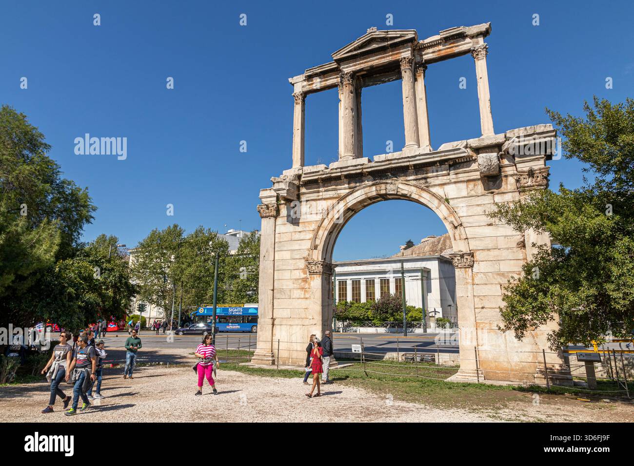 Athens, Greece. Wide angle view of the Arch of Hadrian with passing ...