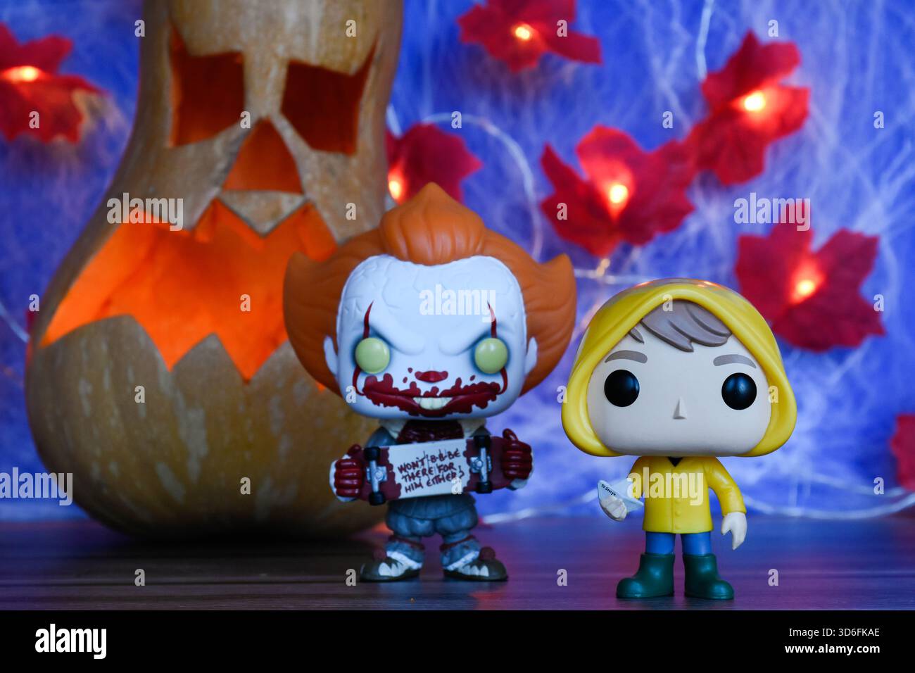 Funko Pop action figures of Pennywise clown and Georgie from horror ...