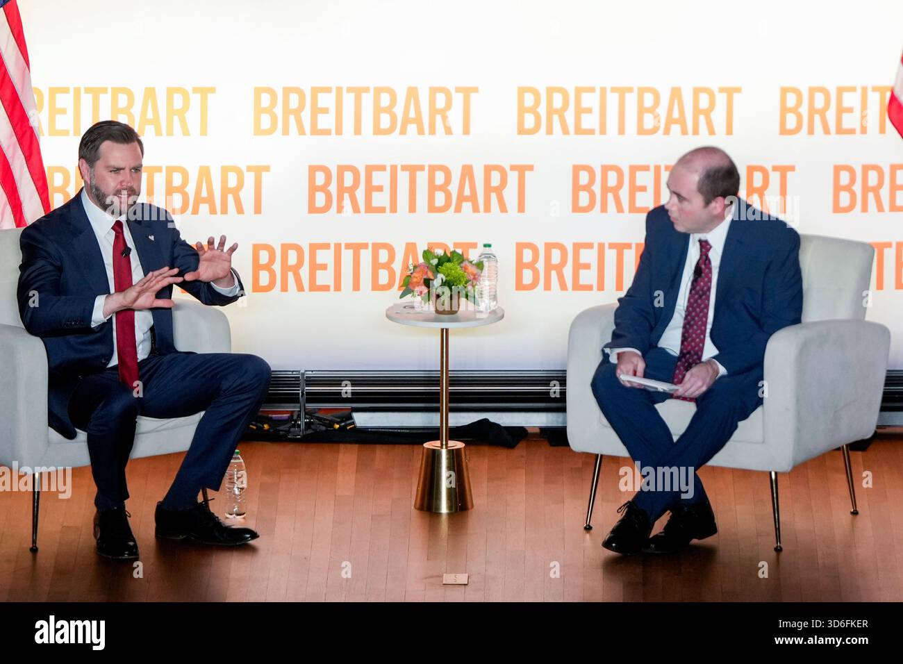 Vice President JD Vance, left, speaks with Breitbart News Washington ...