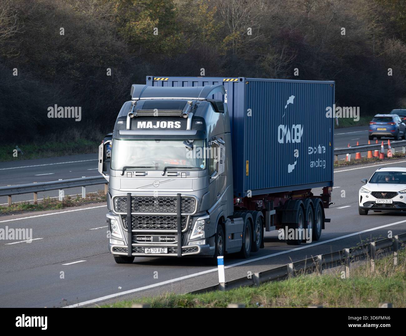 Majors Volvo lorry carrying a CMA CGM shipping container on the M40 ...