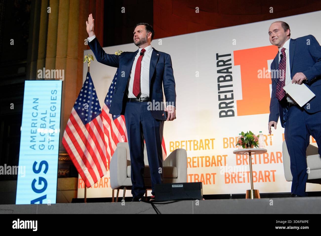 Vice President JD Vance, left, arrives to speak with Breitbart News ...