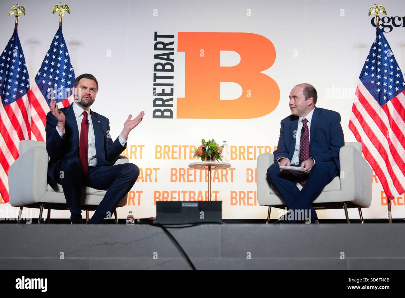 Vice President JD Vance, left, speaks with Breitbart News Washington ...