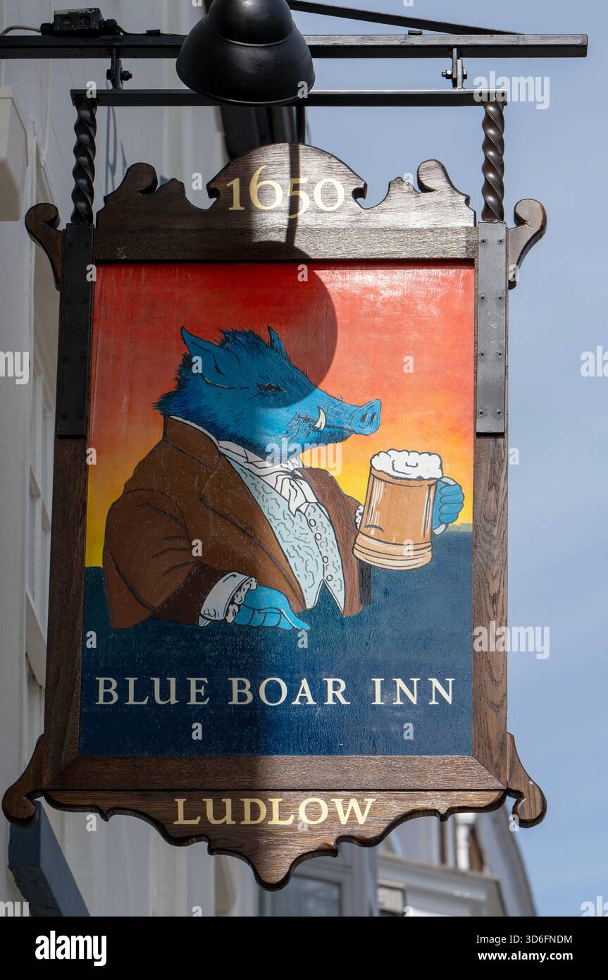 Traditional hanging pub sign at The Blue Boar Inn - public house - Mill ...