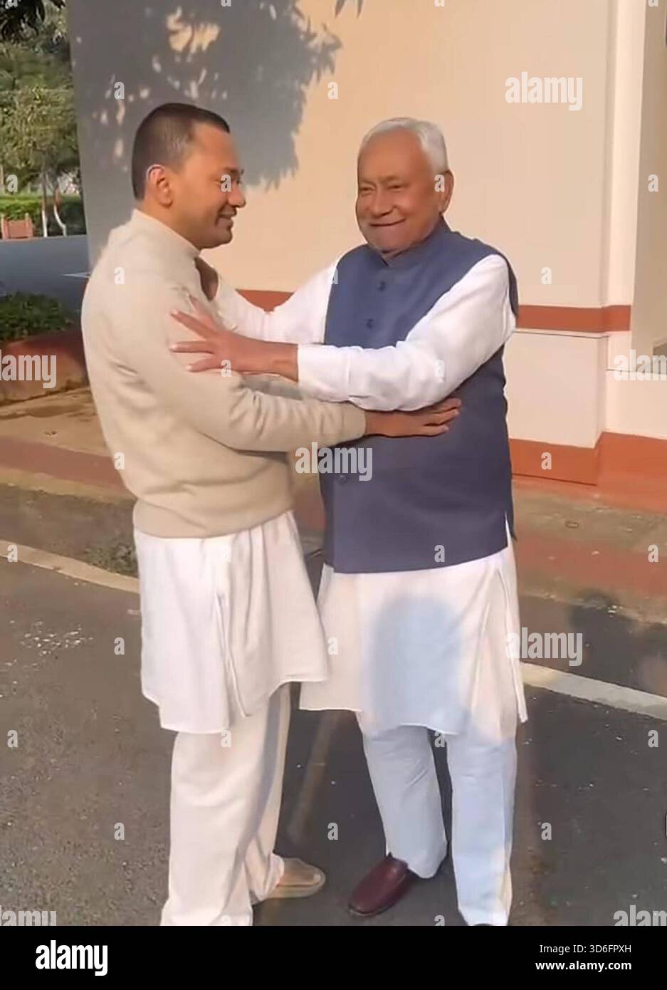 PATNA, INDIA - NOVEMBER 20: Son Nishant Kumar greets his father Bihar ...