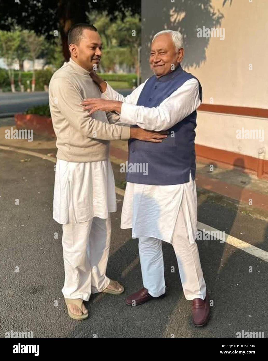 PATNA, INDIA - NOVEMBER 20: Son Nishant Kumar greets his father Bihar ...