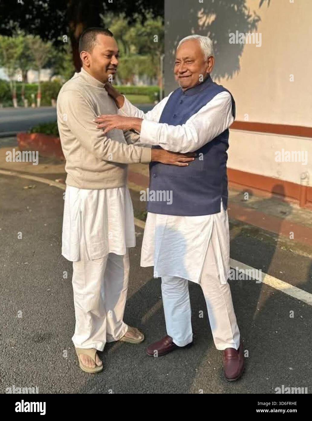 PATNA, INDIA - NOVEMBER 20: Son Nishant Kumar greets his father Bihar Chief Minister Nitish ...