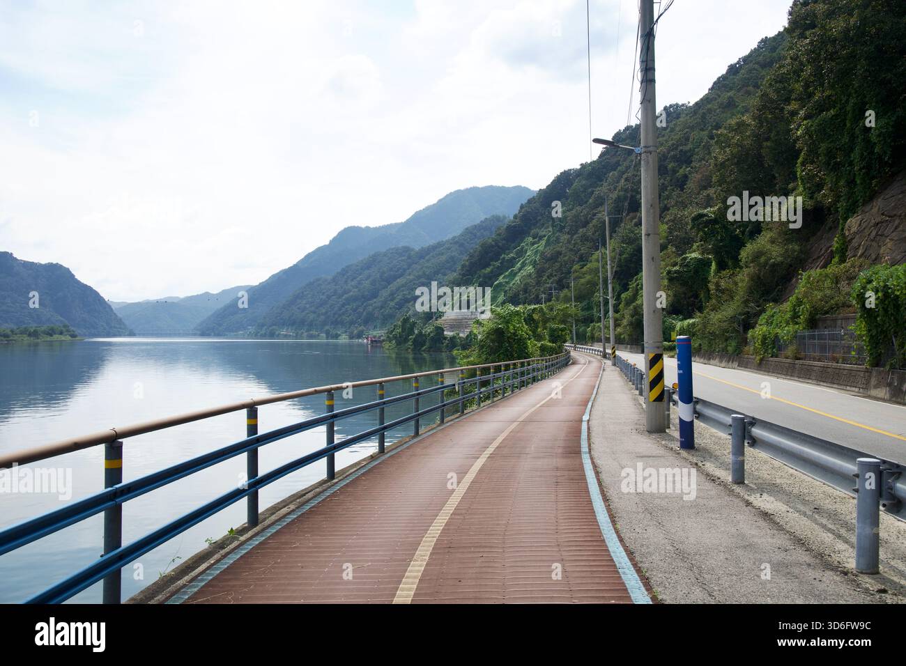 A timber-decked section of the riverside bike path follows the ...