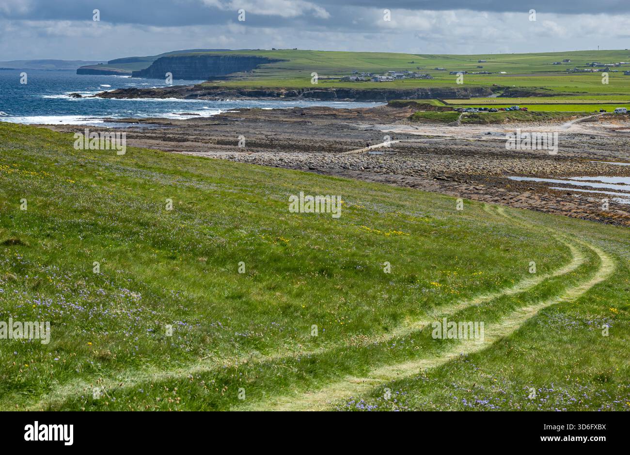 View of tidal causeway at low tide from Brough of Birsay to Orkney ...