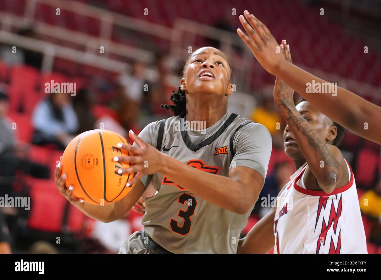Oklahoma State guard Micah Gray (3) prepares to take the shot during an ...