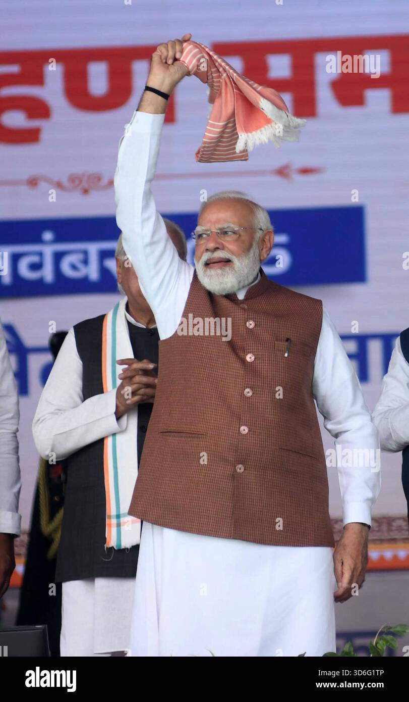 PATNA, INDIA - NOVEMBER 20: Prime Minister Narendra Modi waves Gamcha a ...