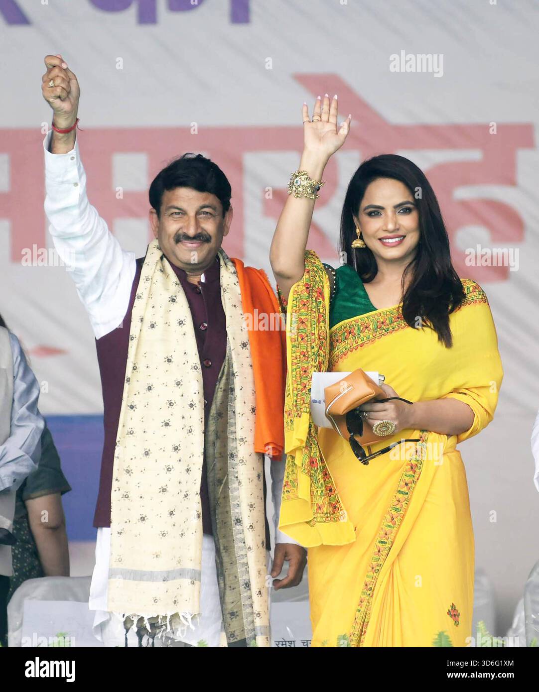 PATNA, INDIA - NOVEMBER 20: BJP MP Manoj Tiwari and Bollywood actress ...