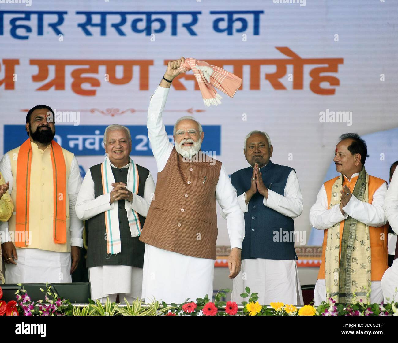 PATNA, INDIA - NOVEMBER 20: Prime Minister Narendra Modi waves Gamcha a ...