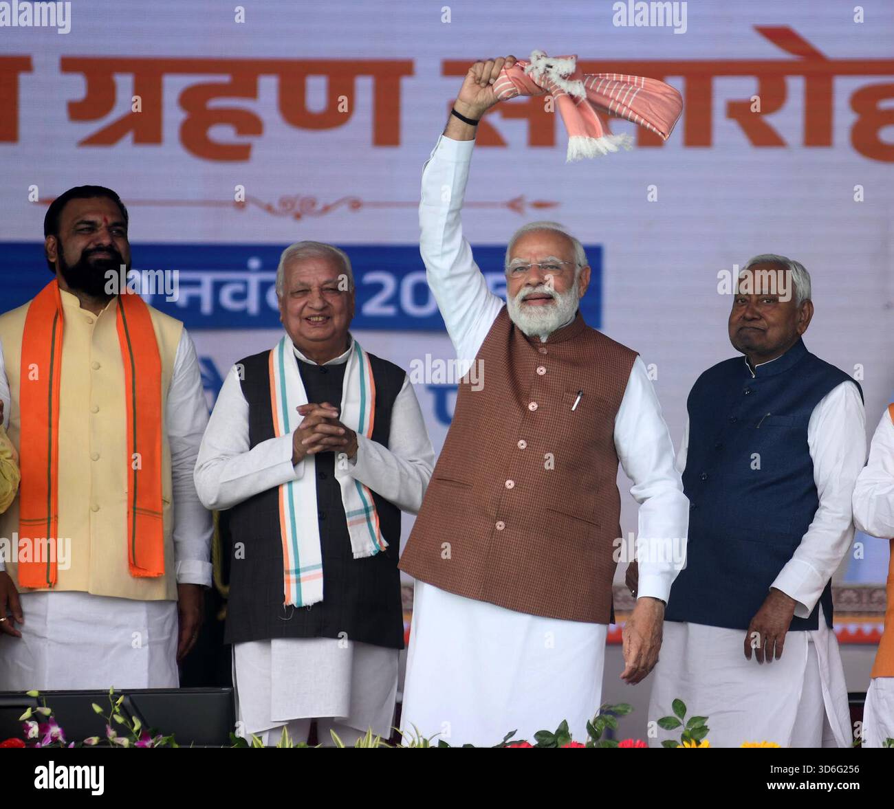 PATNA, INDIA - NOVEMBER 20: Prime Minister Narendra Modi waves Gamcha a ...