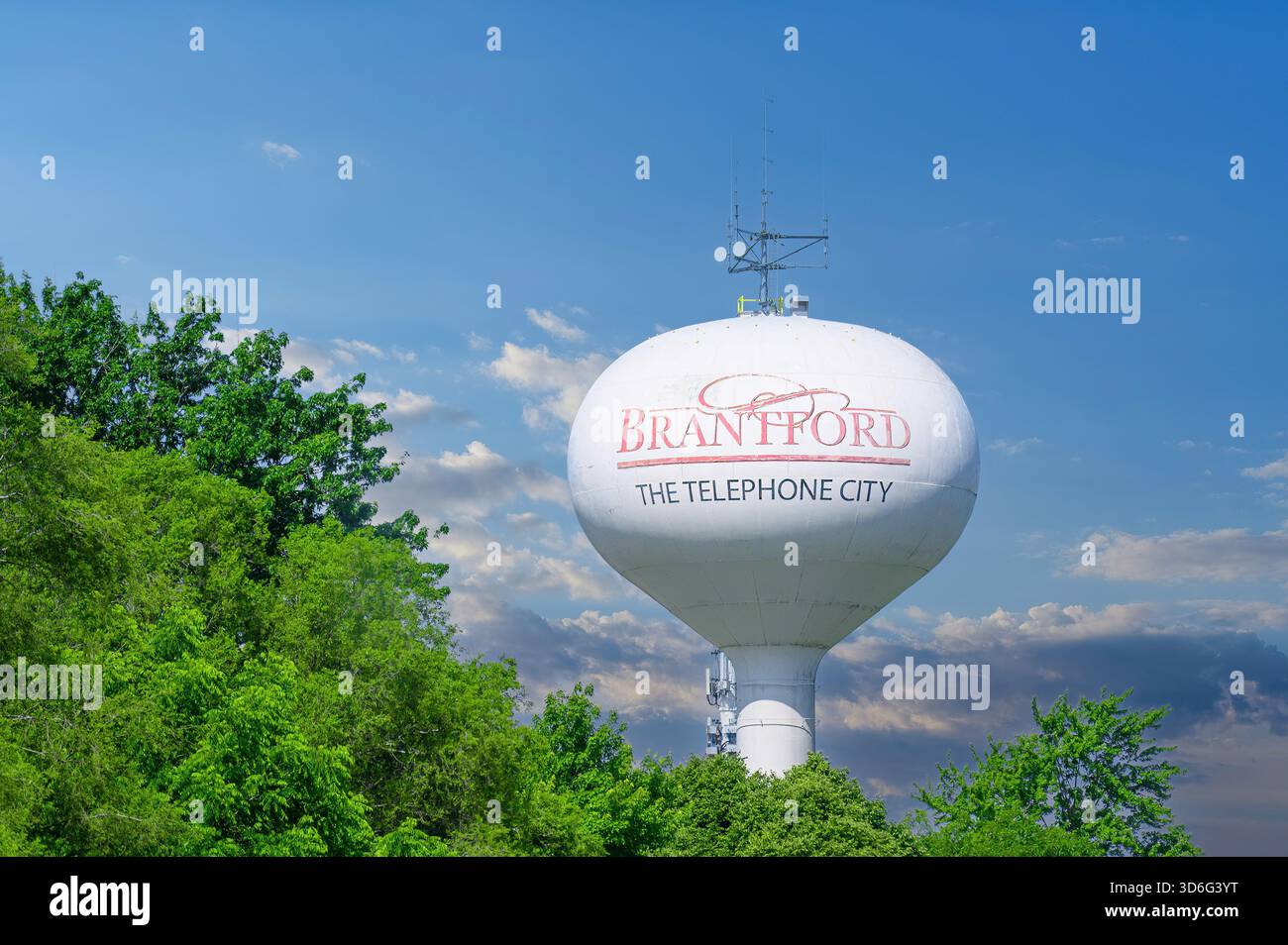 A huge storage tank with a sign reading Brantford, The Telephone City ...