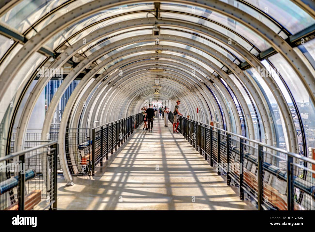 Glass-enclosed tubular walkway at the Centre Pompidou in Paris, France ...