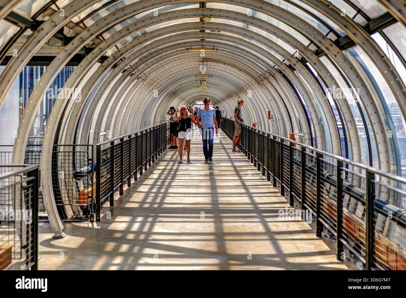 Glass-enclosed tubular walkway at the Centre Pompidou in Paris, France ...
