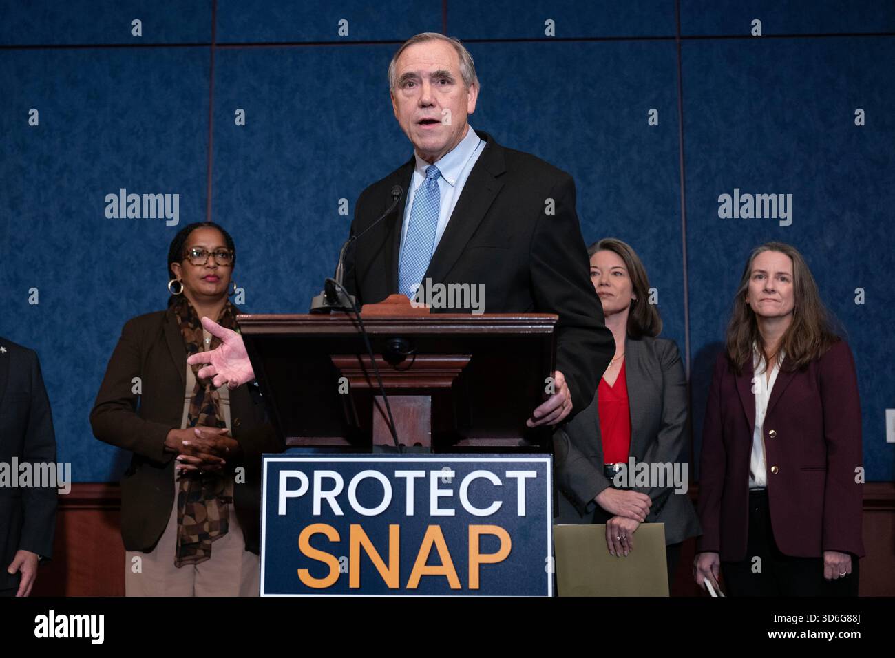 Sen. Jeff Merkley, D-Ore., speaks during a news conference on legislation to reverse SNAP cuts ...