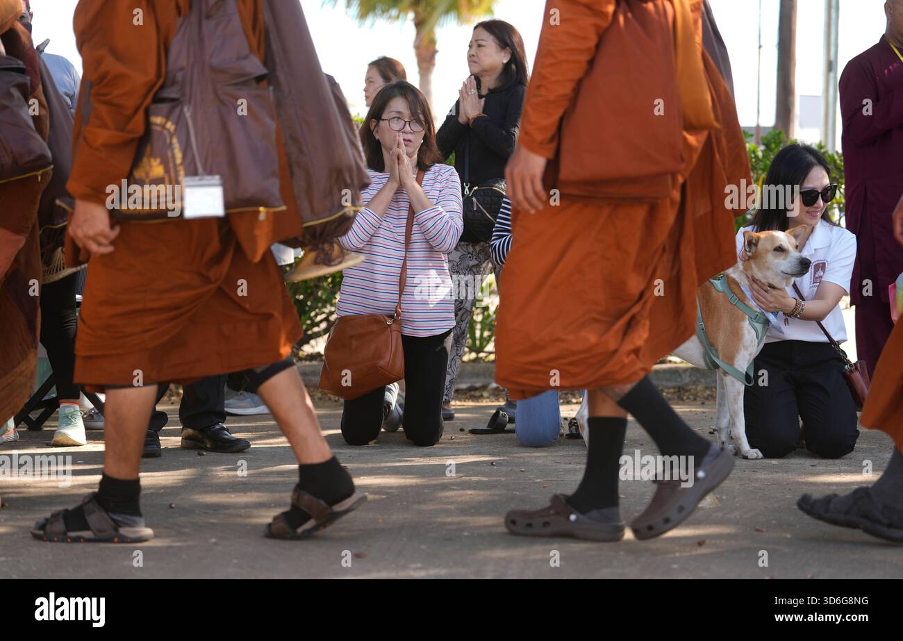People watch as the Buddhist monks from the Huong Dao Vipassana Bhavana Center in Fort Worth ...