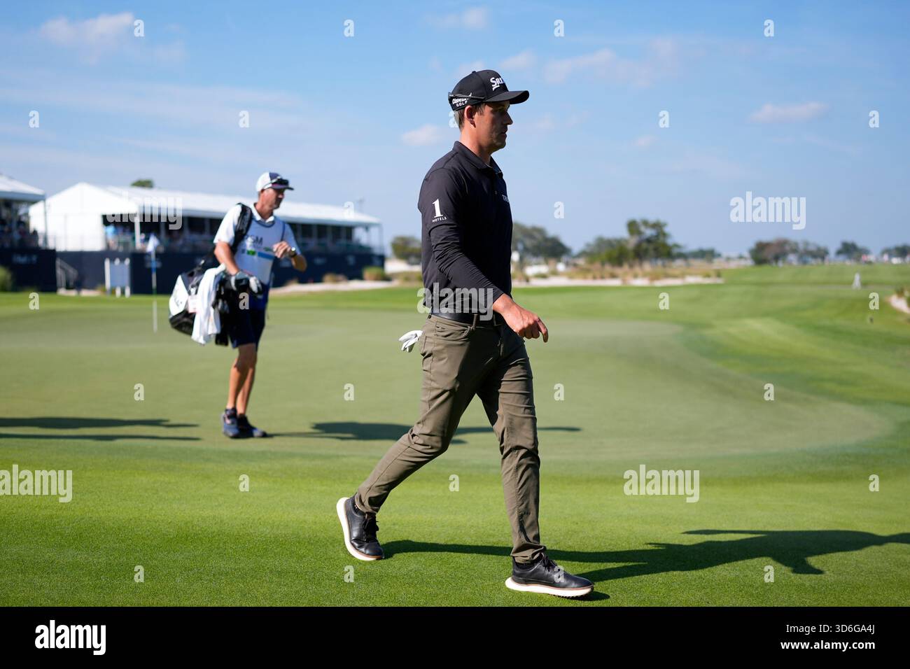 Andrew Putnam walks off the 18th green during the first round of the ...