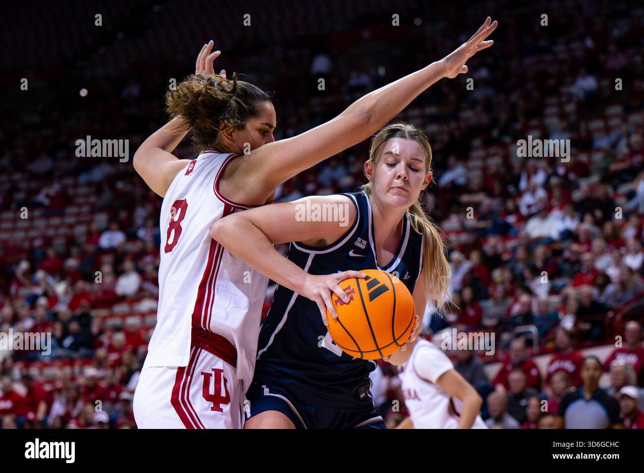 Butler forward Mallory Miller (24) is defended by Indiana forward ...