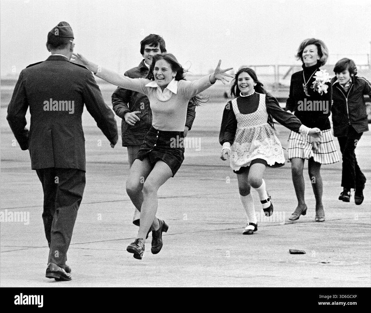 FILE - Released prisoner of war Lt. Col. Robert L. Stirm is greeted by ...