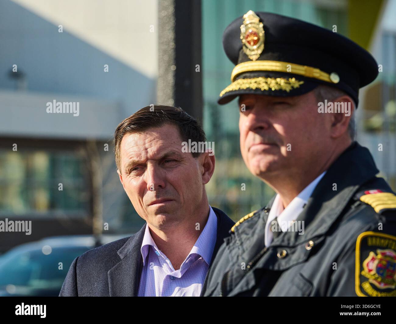 Brampton Mayor Patrick Brown, left, looks on as Brampton fire chief ...