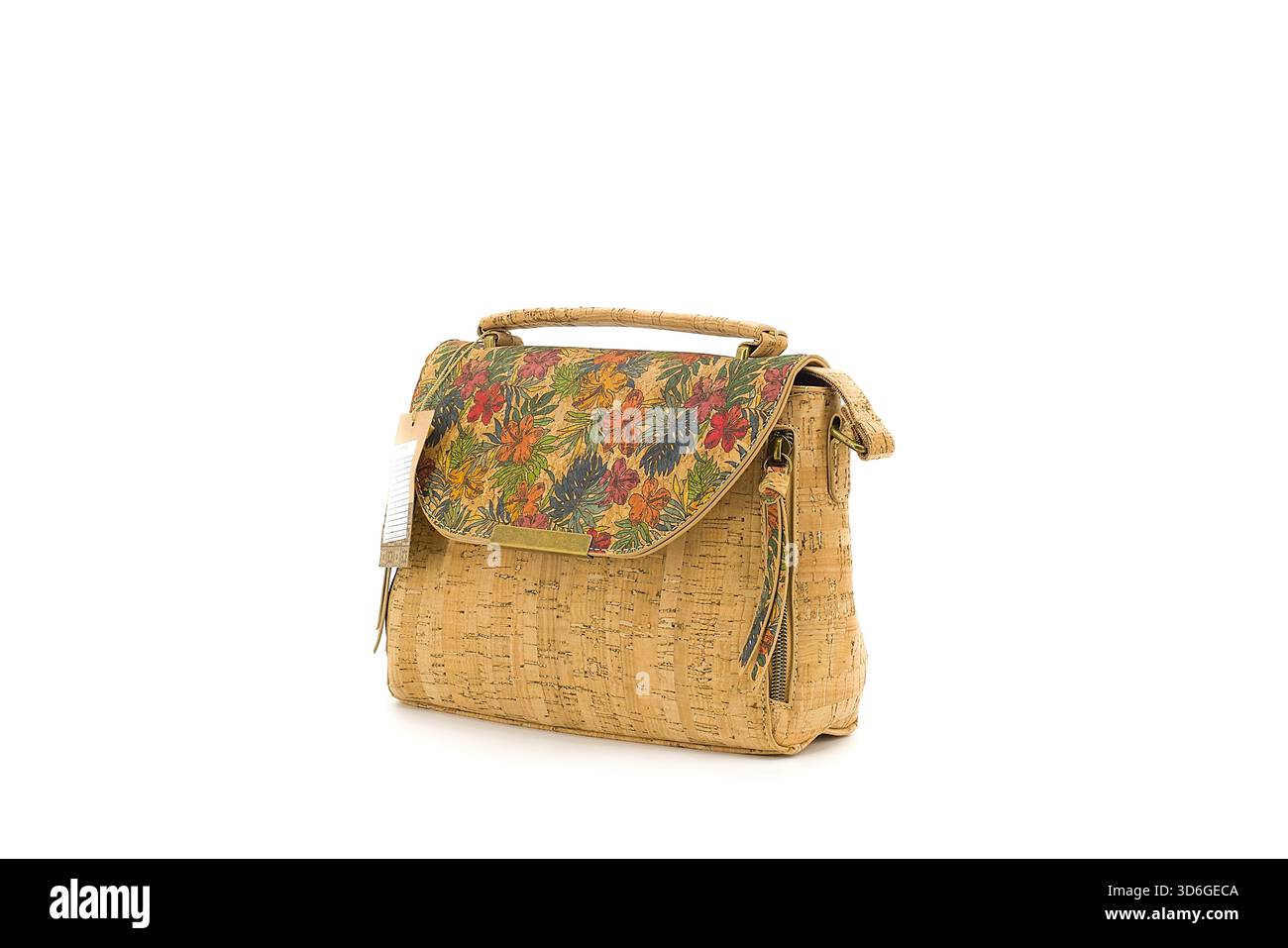 Eco-friendly cork purse decorated with artistic motifs, shown on a ...