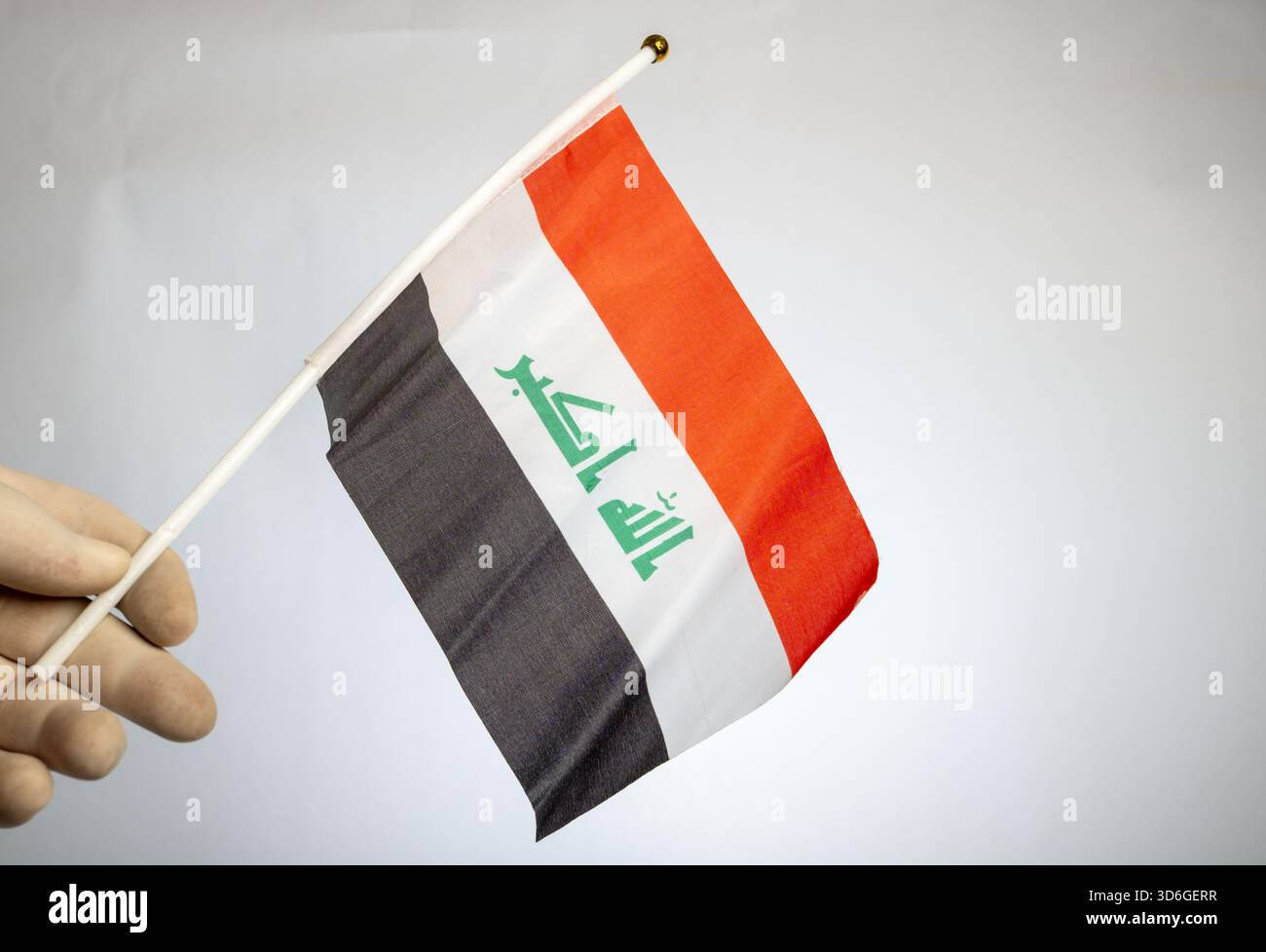 Tricolor design of the Iraqi flag featuring the green Arabic phrase ...