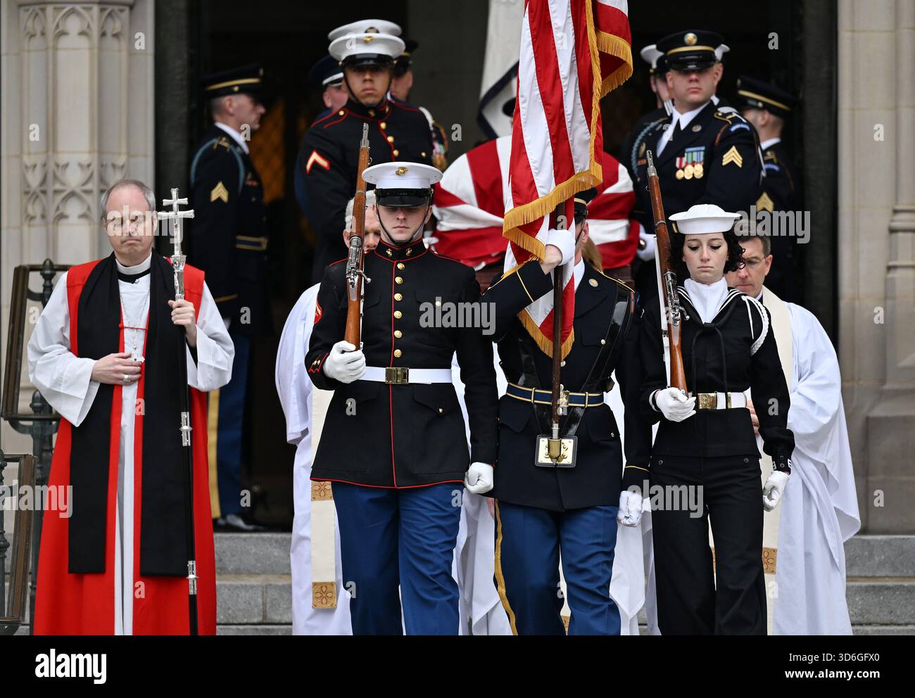 A military guard carries the casket of former Vice President Dick ...