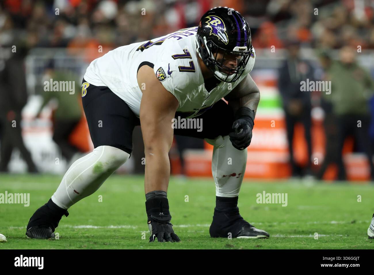Baltimore Ravens guard Daniel Faalele (77) lines up for a play during an NFL football game ...